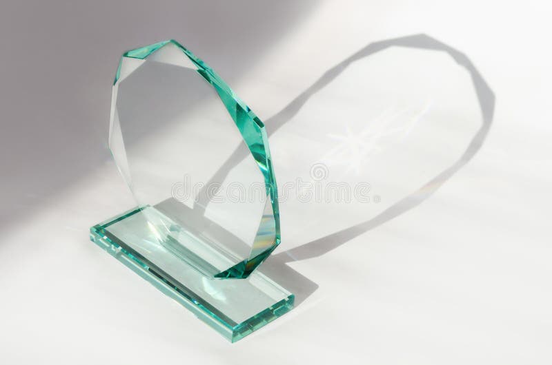 Close-up of Thick Glass Award with Highlights and Shadow on White ...