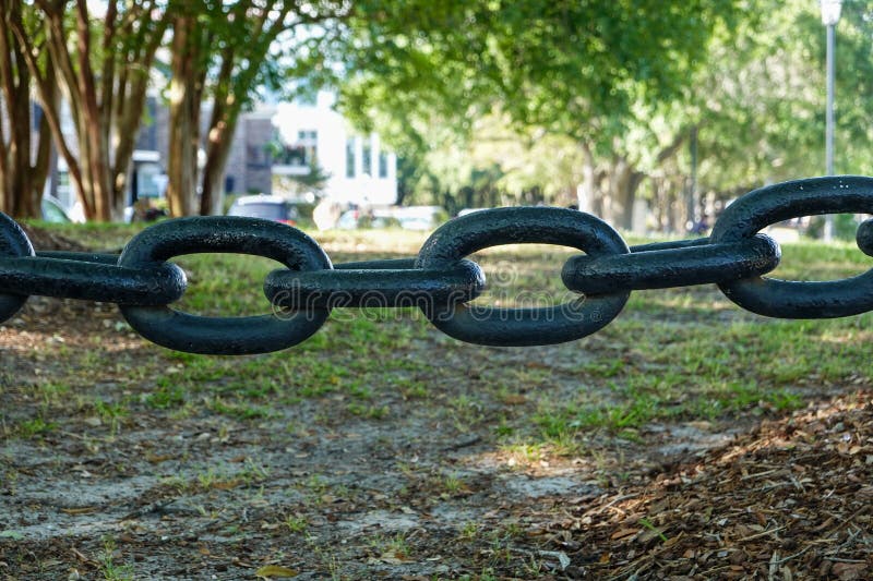 Close-up of Thick Iron Chain Link in Park with Trees Stock Image ...