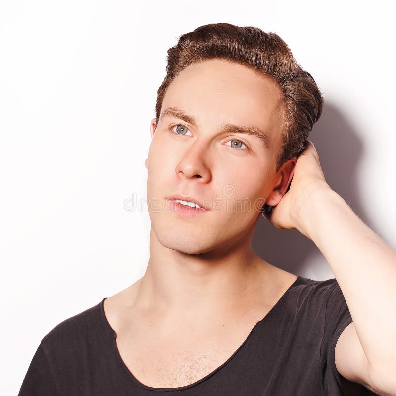 Close Up of a Thinking Young Man on White Background Stock Photo ...