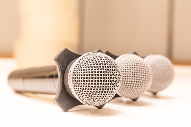 Close-up Three Microphone Heads with Warm Fall Color and Blurred Stock ...