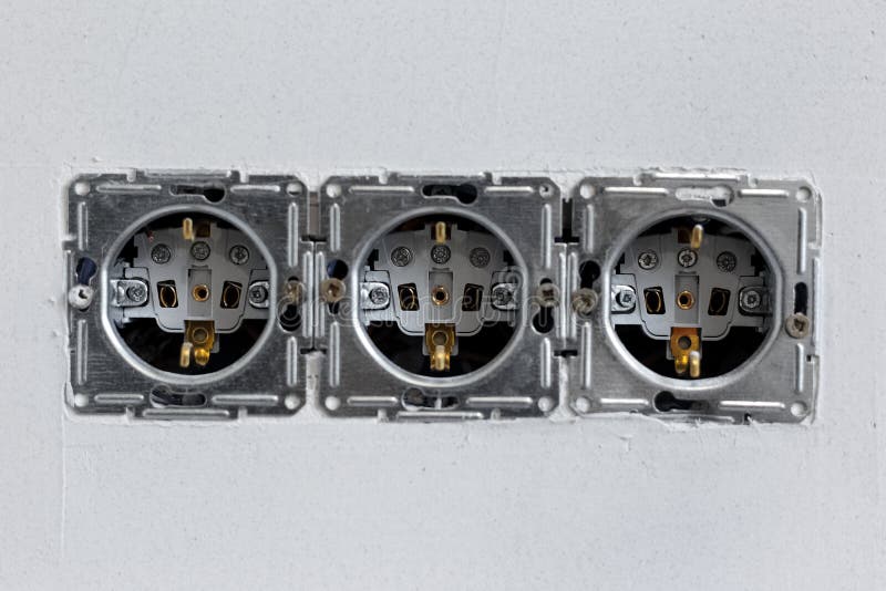 Set of Three Sockets on the Wall Stock Photo - Image of triple, room ...