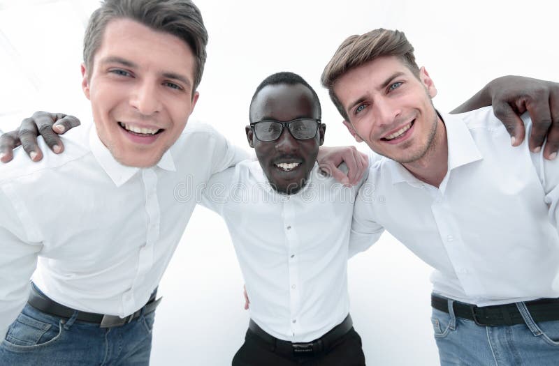 Close Up.three Successful Young Men Standing Together Stock Image ...
