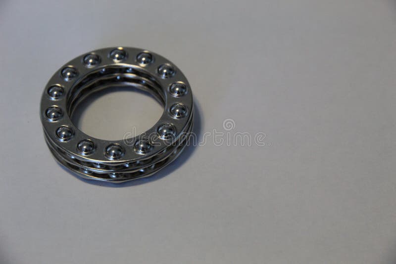 Two Wheel Ball Bearings stock photo. Image of dark, manufacturing ...