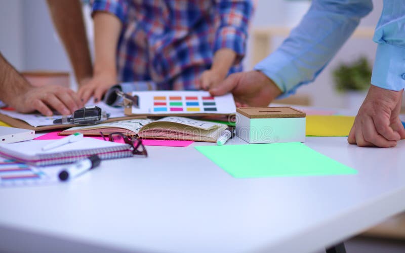 Close-up of Three Young Creative Designers Working Stock Photo - Image ...