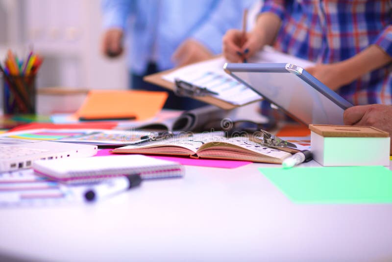 Close-up of Three Young Creative Designers Working Stock Photo - Image ...