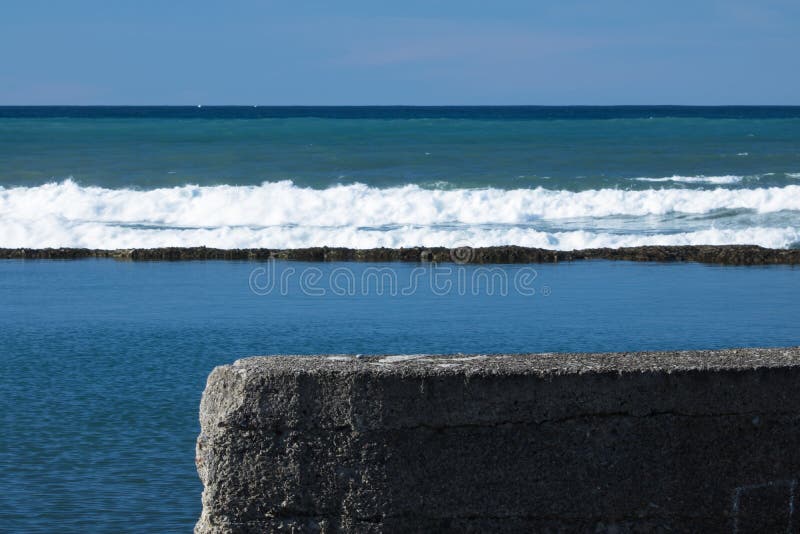 Close Up of Tide Pool Wall with Waves of Sea Water - Abstract Creative ...