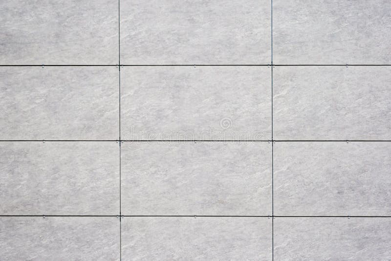 Close Up of a Tiled Wall with a Grid Pattern, Featuring Light Gray ...