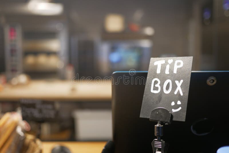 Close Up of a Tips Box in a Cafe Stock Image - Image of retirement ...