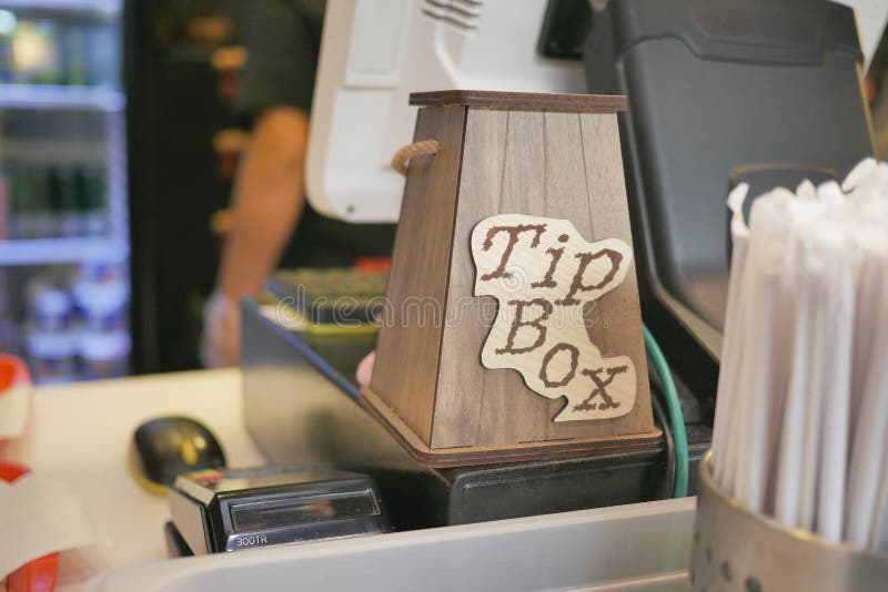 Close Up of a Tips Box in a Cafe Stock Photo - Image of financial ...