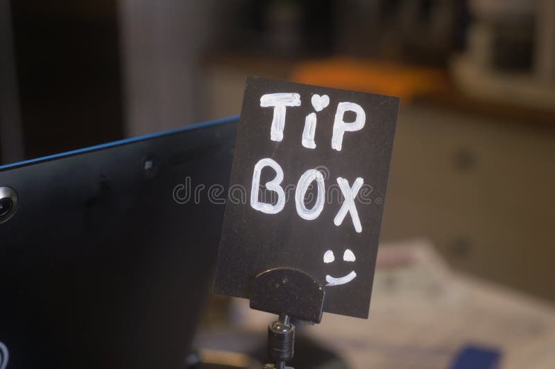 Close Up of a Tips Box in a Cafe Stock Image - Image of earnings, tips ...