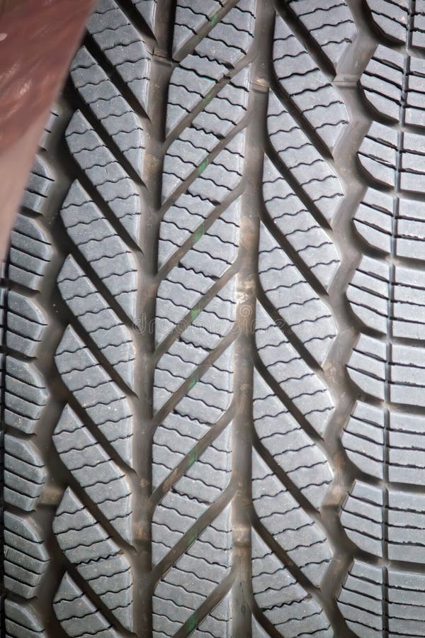 A close-up of a tire stock photo. Image of contact, pavement - 323823356
