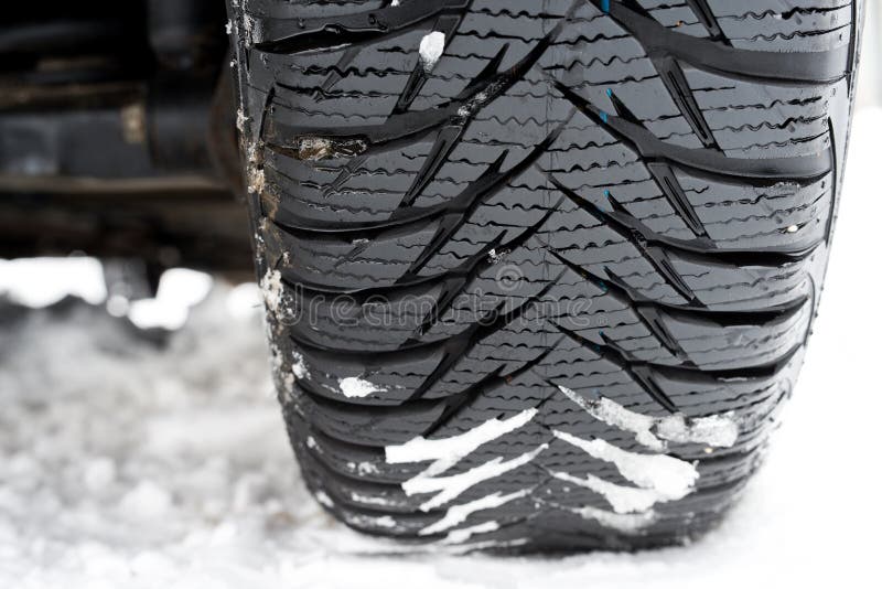 Close Up of a Tire with Winter Thread Stock Photo - Image of road ...