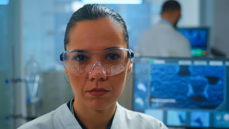 Close Up of Tired Scientist Doctor Looking at Camera Smiling Stock ...