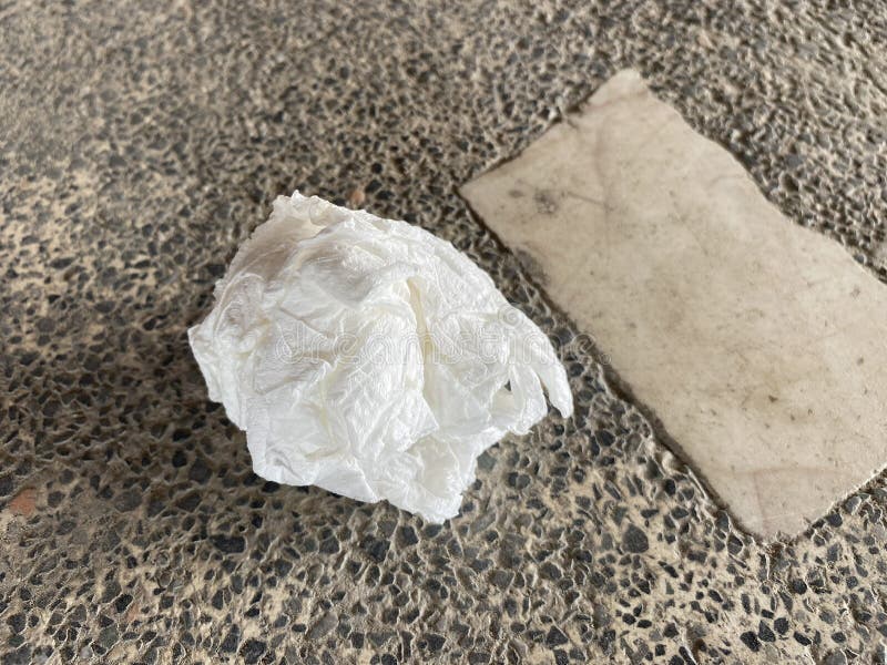 Tissue on cement floor stock photo. Image of cement - 209003818