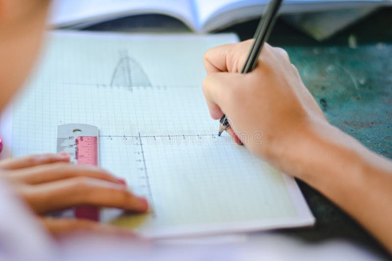 Students Writing Mathematics Fomulars on a Glass Board Stock Image ...