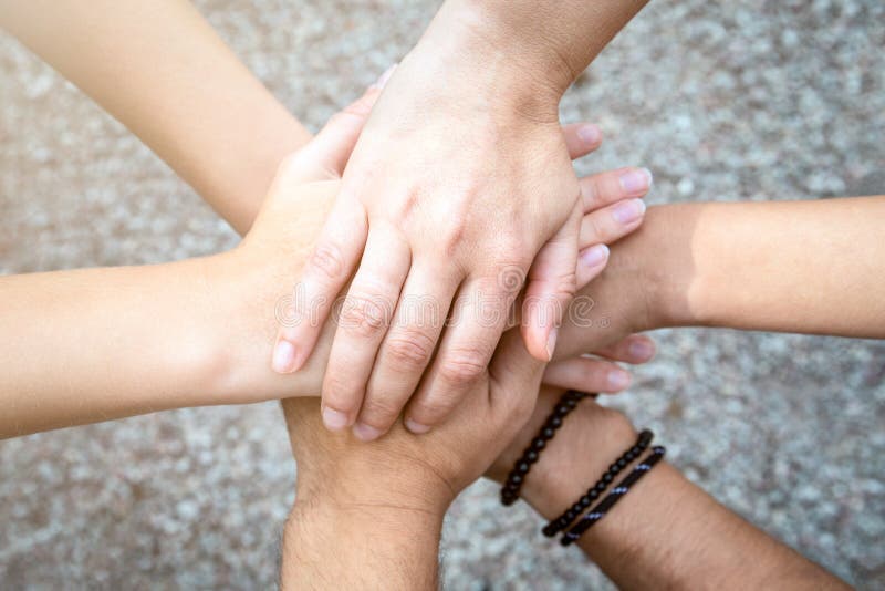 Close Up Top View of People Putting Their Hands Together Stock Image ...