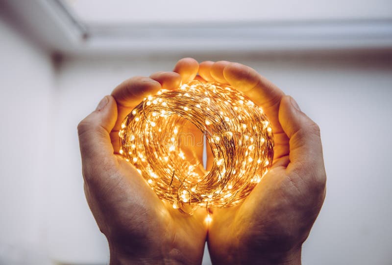 Close Up Top View of Person Holding Roll of Wire Micro LED String ...