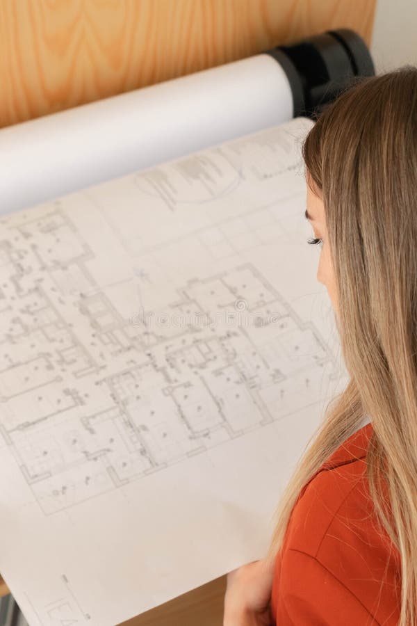 Top View of Plotter Printer Printing Floor Plans by Young Beautiful ...