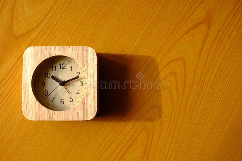 Top View of Wooden Clock on the Table Background. Stock Image - Image ...