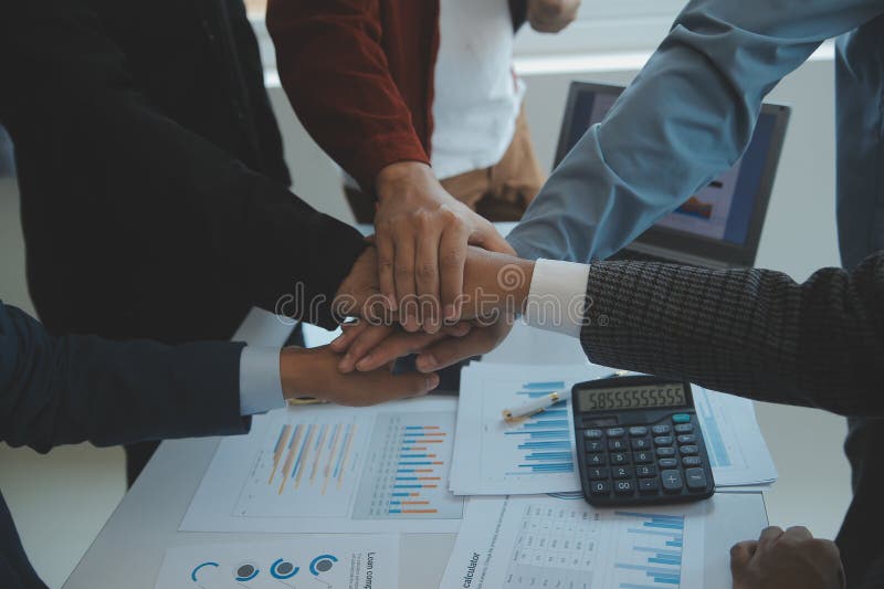 Close Up Top View of Young Business People Putting Their Hands Together ...