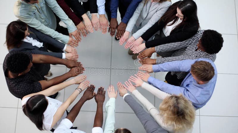 Friends with Stack of Hands Showing Unity and Teamwork. Stock Photo ...