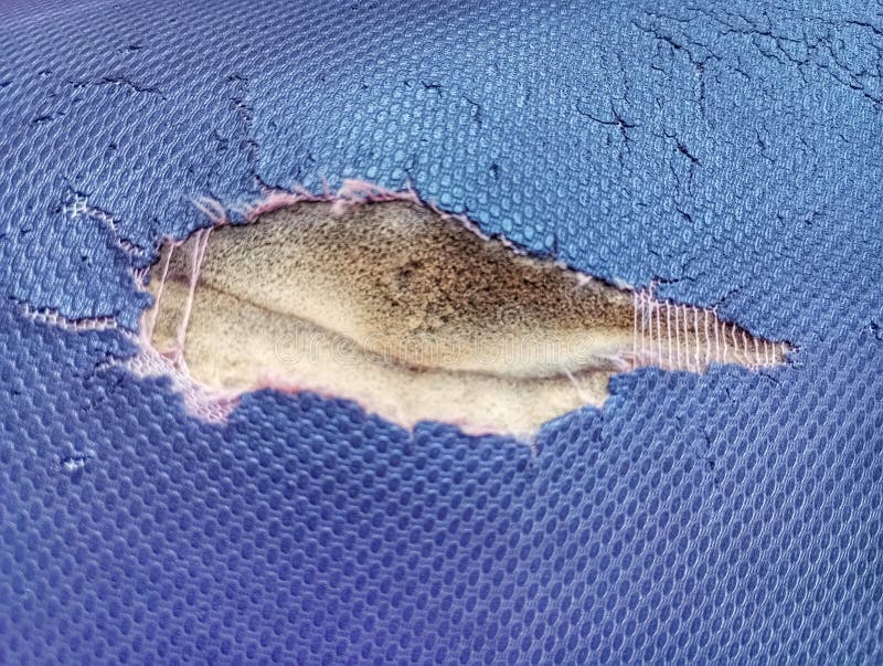 Close-up of a Torn and Damaged Bench Fabric, Showing Its Worn-out ...