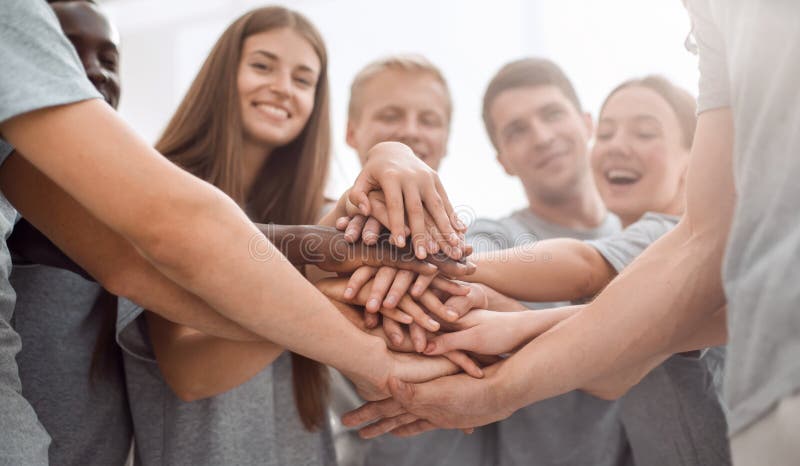 Close Up. Tower from the Hands of a Young Team Stock Photo - Image of ...