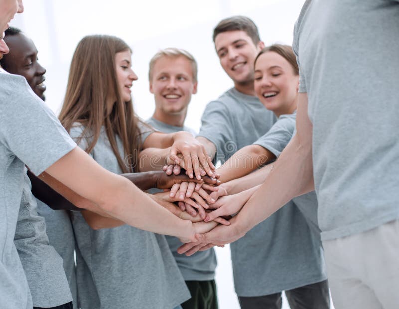 Close Up. Tower from the Hands of a Young Team Stock Photo - Image of ...