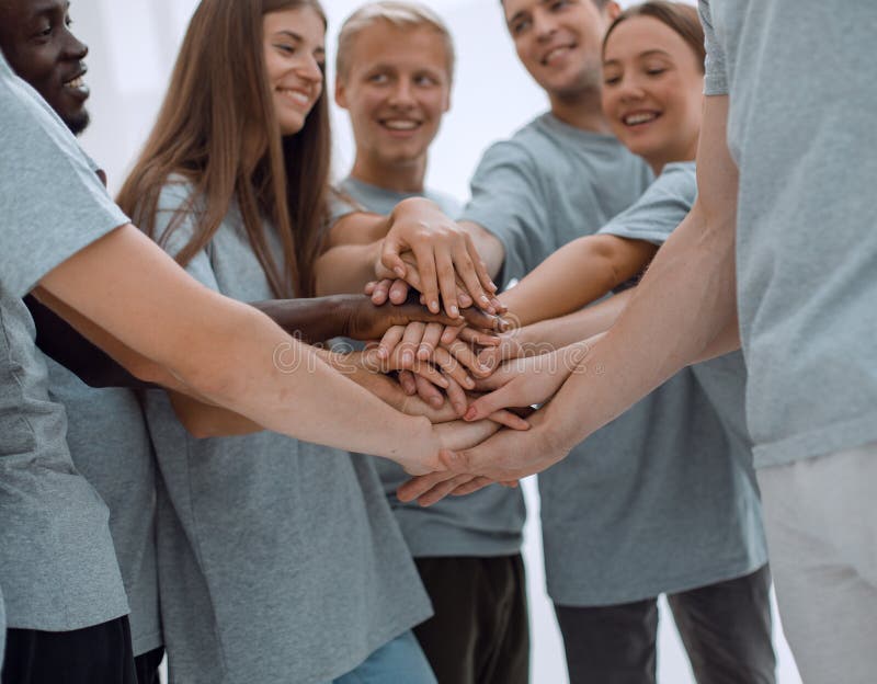 Close Up. Tower from the Hands of a Young Team Stock Image - Image of ...
