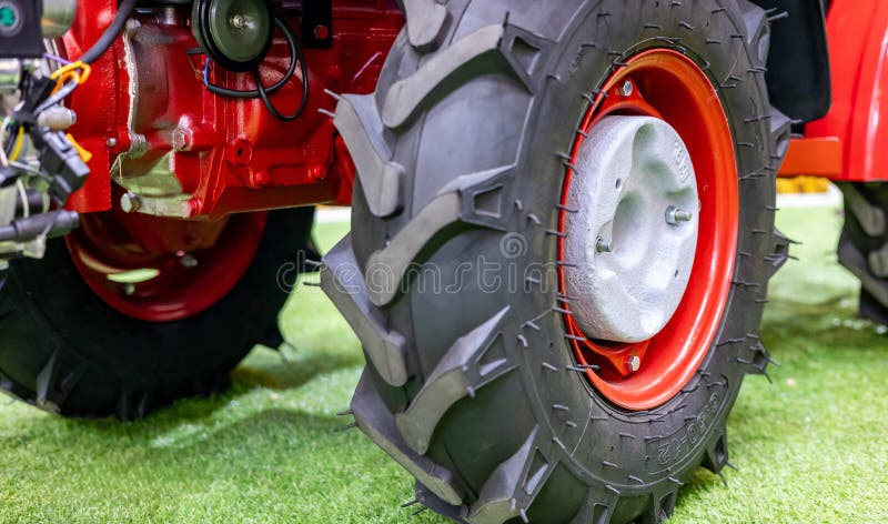Close-up of Tractor Wheels. Modern Walk-behind Tractor. Red Tractor ...