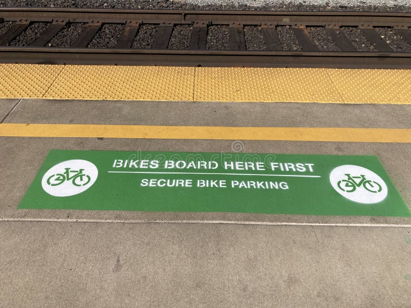 A Close-up of a Train Station Concrete Platform Shows a Green Zone for ...