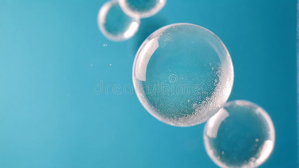 Close-up of Translucent Bubbles on a Teal Blue Background Stock ...