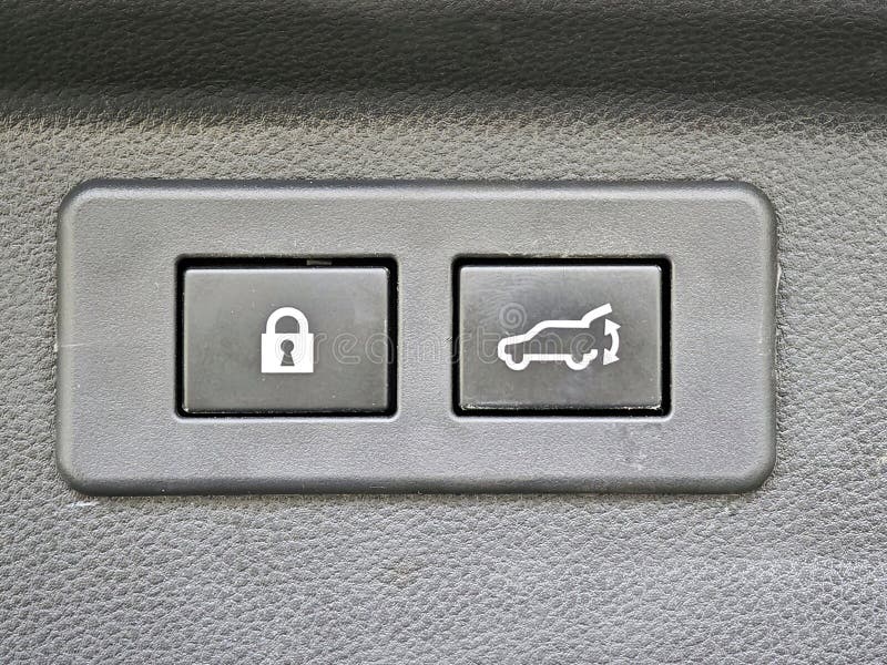 Close Up of Trunk Lock and Open Buttons Inside Modern Car Stock Photo ...