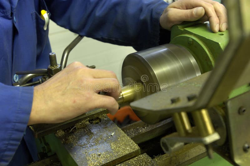 Close Up of a Turner Hand in a Factory Stock Photo - Image of factory ...