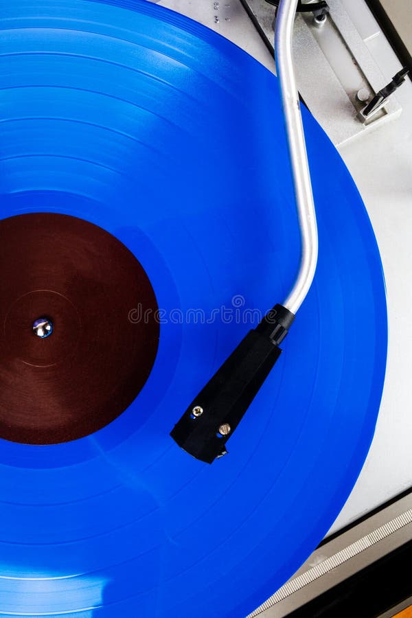 Close Up of Turntable Needle on a Blue Vinyl Stock Photo - Image of ...
