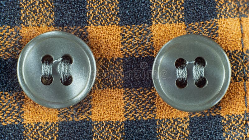 Close Up of Two Buttons on the Fabric of a Garment Stock Photo - Image ...