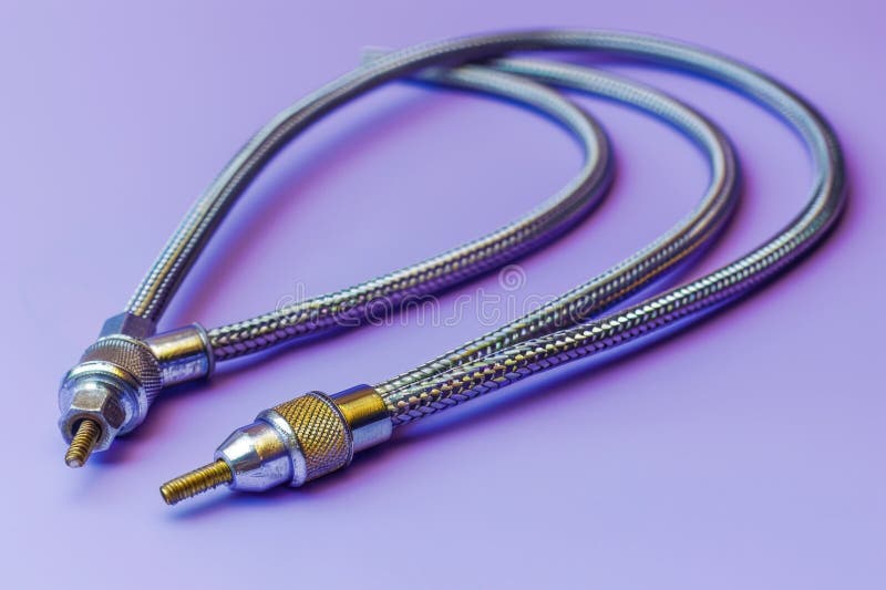 Close-up of Two Cables on a Purple Surface, Great for Technology or ...