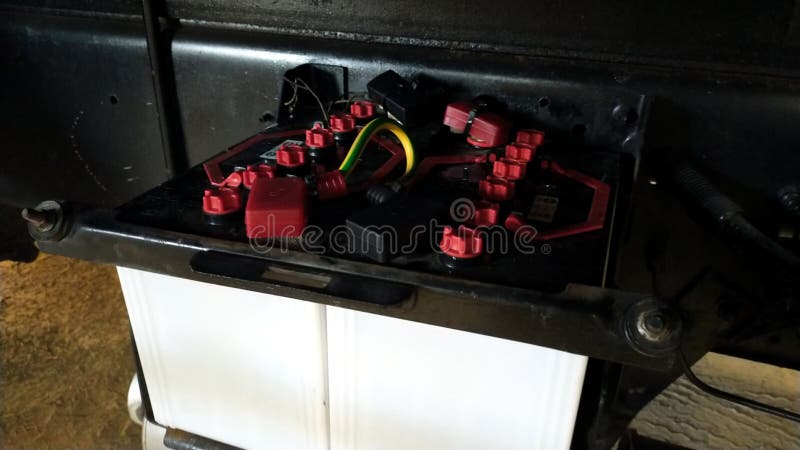 Close-Up of Two Car Batteries Installed with Red and Black Connectors ...