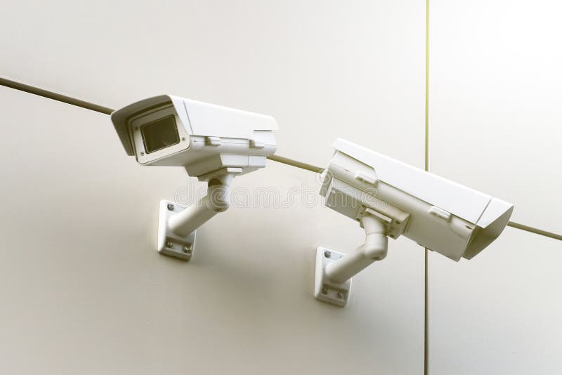 Close-up of Two CCTV Cameras on a White Wall on the Street Stock Photo ...