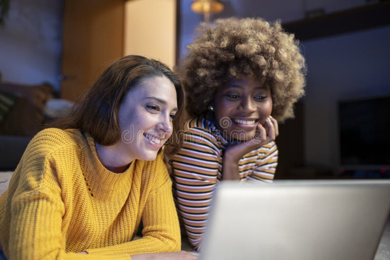 Cheerful Lesbian Couple Having Fun Together And Looking At Camera