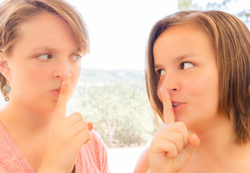 Close Up of Two Young Girls Faces Stock Image - Image of brown, concept ...