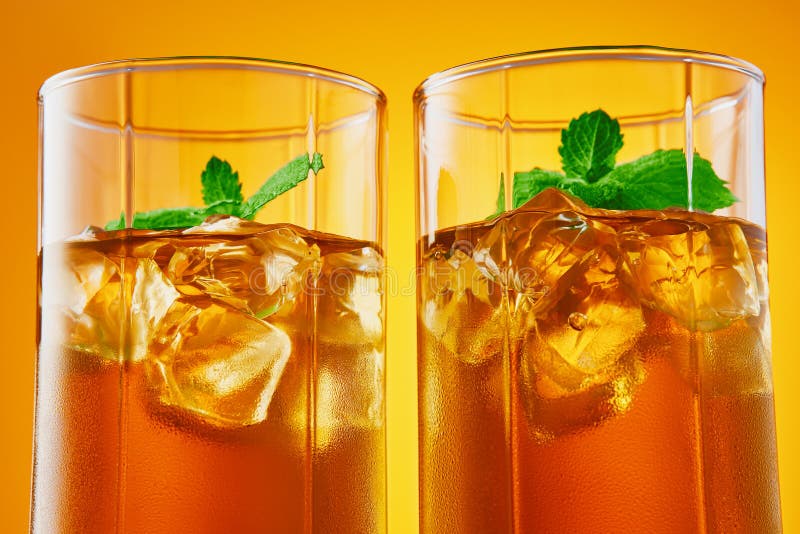 Close-up Two Glasses of Refreshing Iced Tea with Mint Leaves. Studio ...