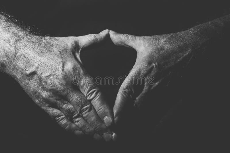 Hands Showing the Famous Merkel Diamond Stock Photo - Image of dark ...