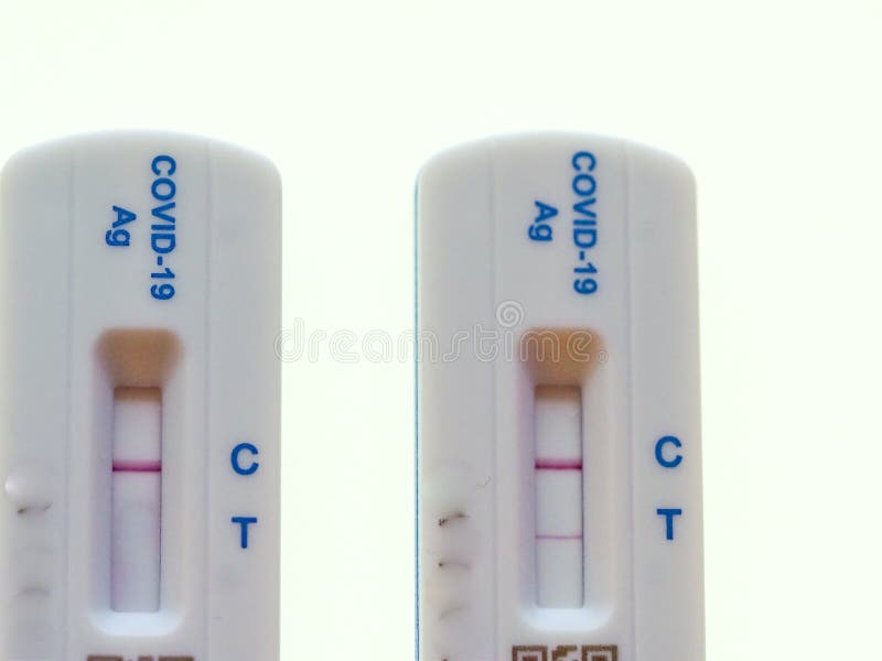 Close-up of Two Lateral Flow Test Results, One Negative, One Positive ...