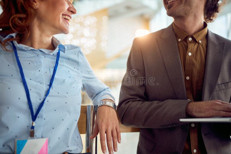 Close Up of Two Motivated Work Colleagues Consulting Stock Photo ...