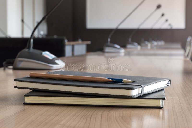 Close Up Two Pencil and Notebook on Table in Meeting Room Stock Photo ...
