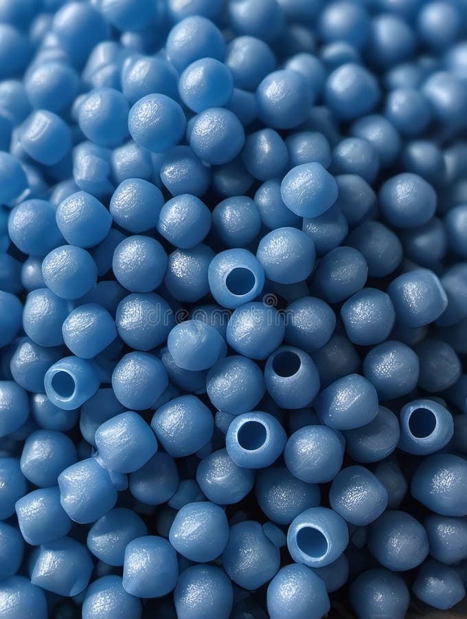 Close Up of a Two Stacks of Blue Plastic Polypropylene Granules on a ...