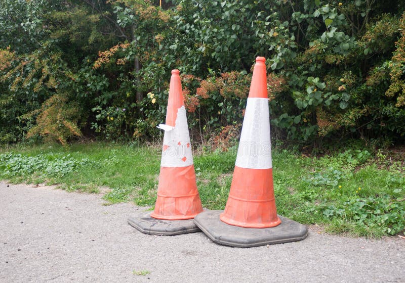 Close Up of Two Traffic Cones on Pavement Stock Photo - Image of road ...