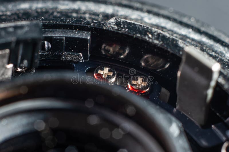 Close-up of Two Very Small Screws Screwed into the Lens Barrel Stock ...