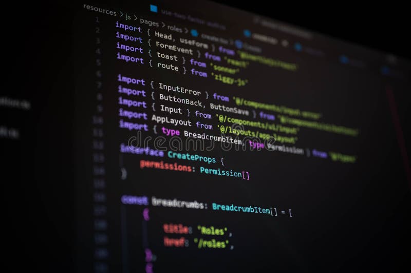 Close-up of TypeScript Code on Dark Editor Screen Showing Module Imports, Interface Declarations ...